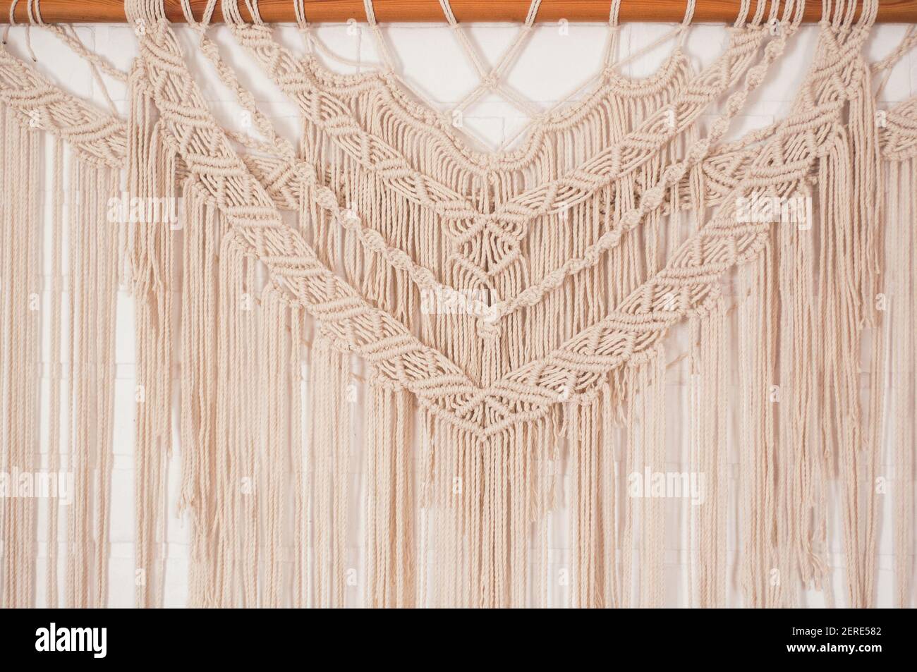 boho style macrame in the living room near the brick wall Stock Photo ...