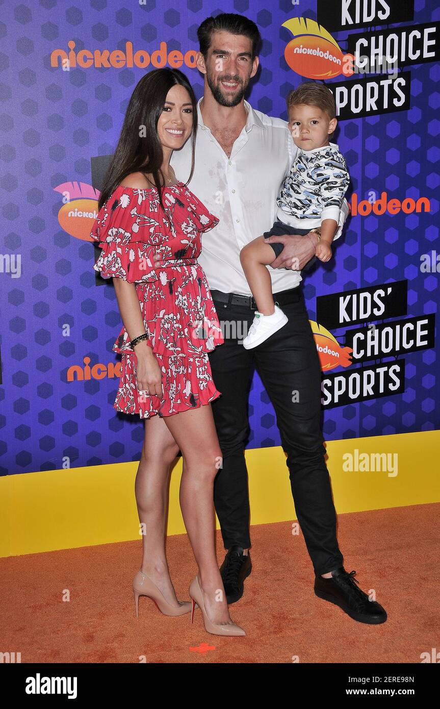 (L-R) Wife Nicole Johnson, Michael Phelps, and Son Beckett Richard ...