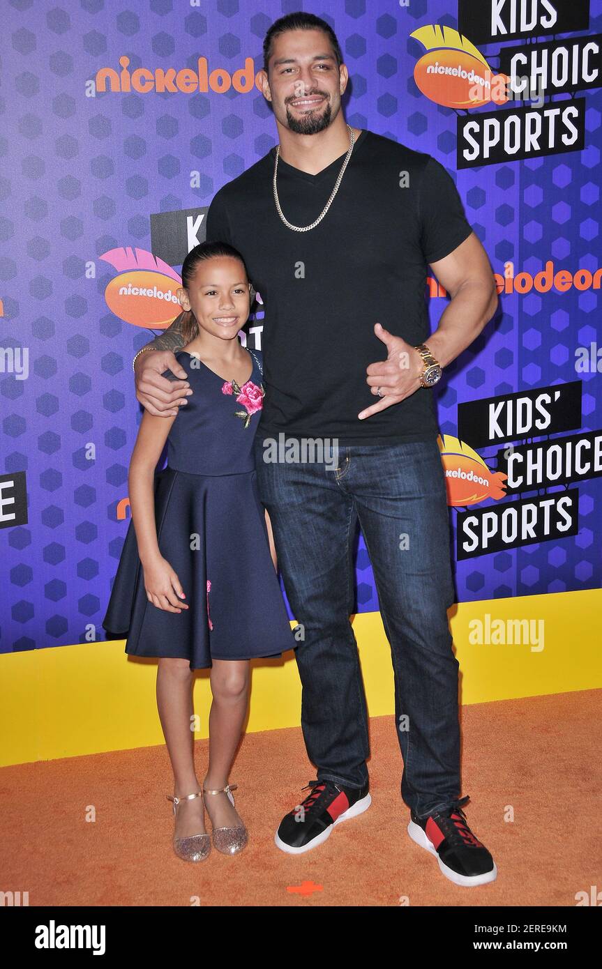 (L-R) Jojo Anoa'I and Roman Reigns arrives at the Nickelodeon's Kids ...