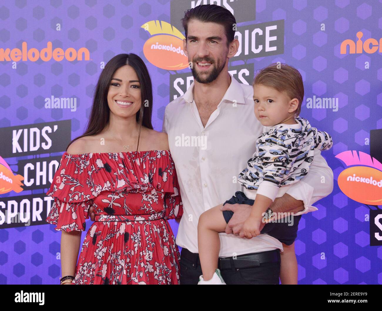(L-R) Nicole Johnson, swimmer Michael Phelps and Beckett Richard Phelps ...