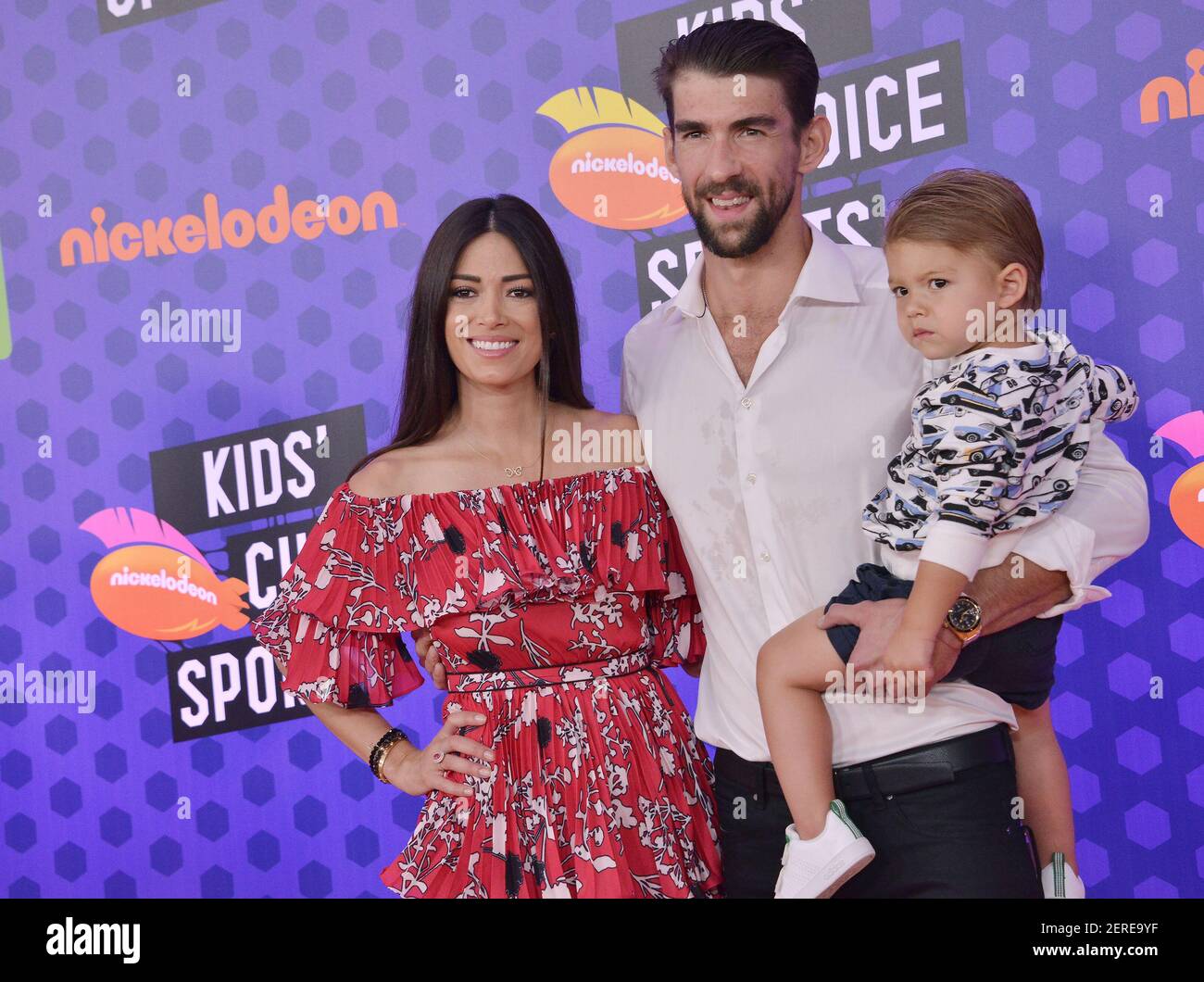 (L-R) Nicole Johnson, swimmer Michael Phelps and Beckett Richard Phelps ...