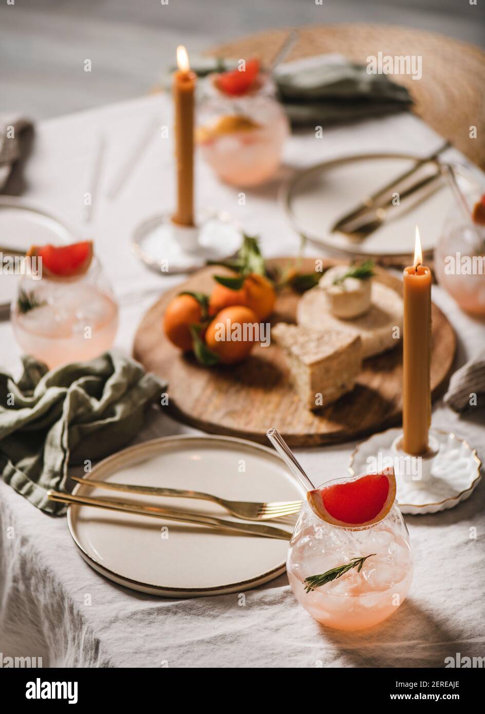 Home cocktail party table setting. Grapefruit rosemary margaritas ...