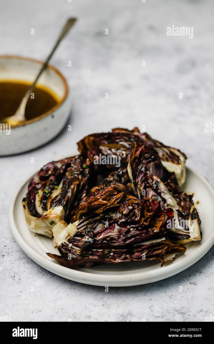 charred radicchio salad with pecorino and balsamic Stock Photo - Alamy