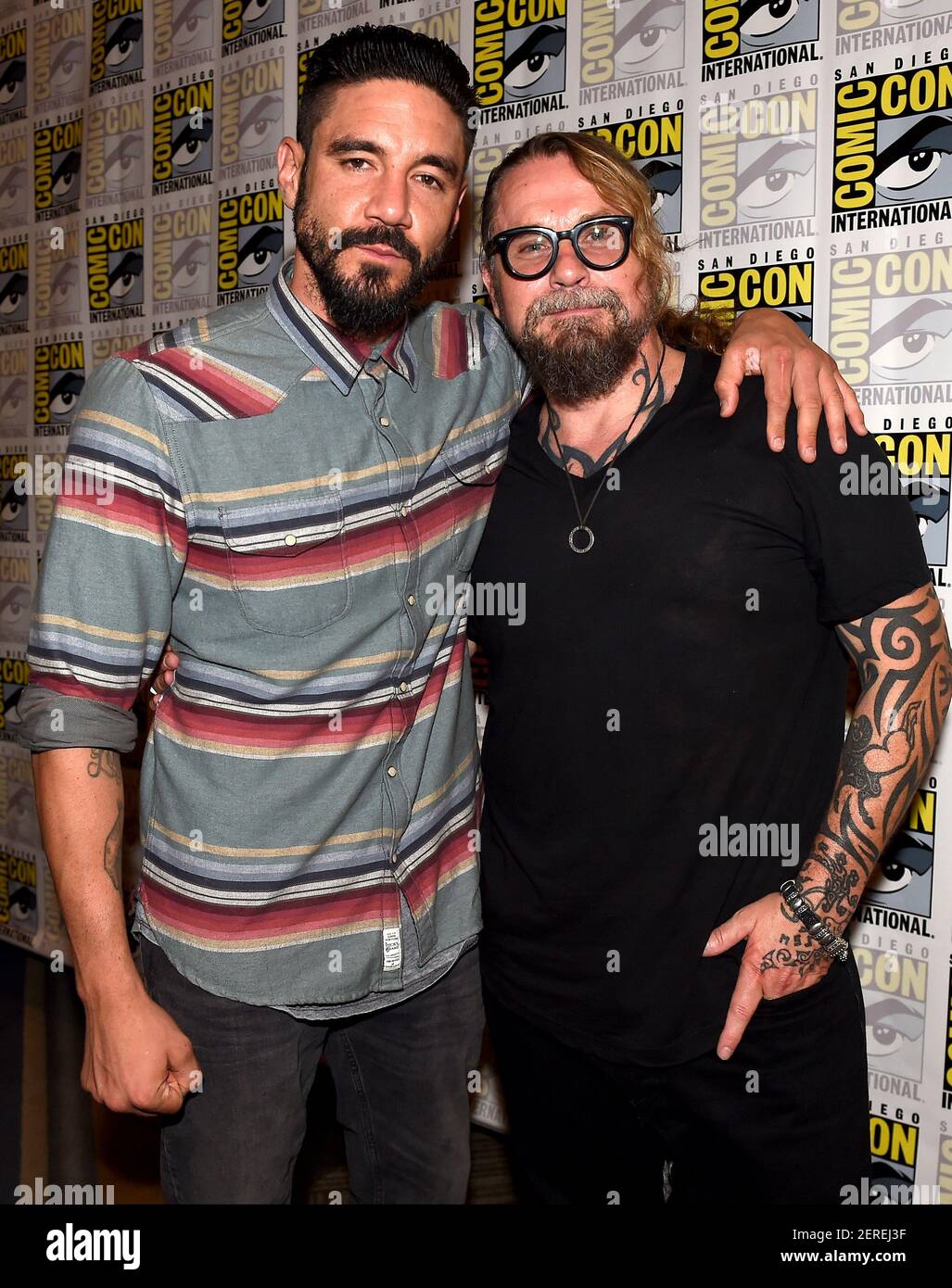 SAN DIEGO - JULY 22: L-R: Cast member Clayton Cardenas and creator Kurt ...