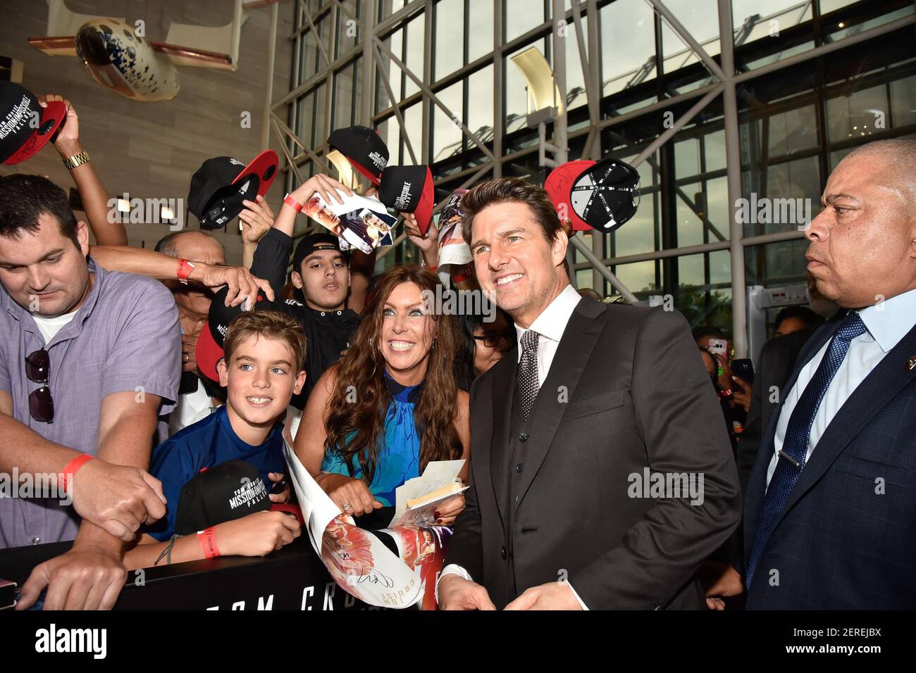 Actor Tom Cruise signs autographs with fans during the "Mission ...
