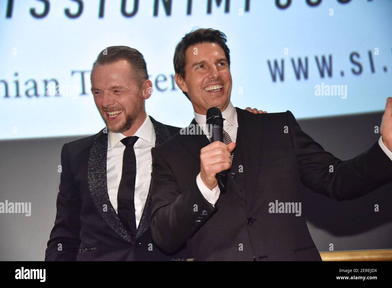 Actors Simon Pegg and Tom Cruise attend the "Mission: Impossible ...