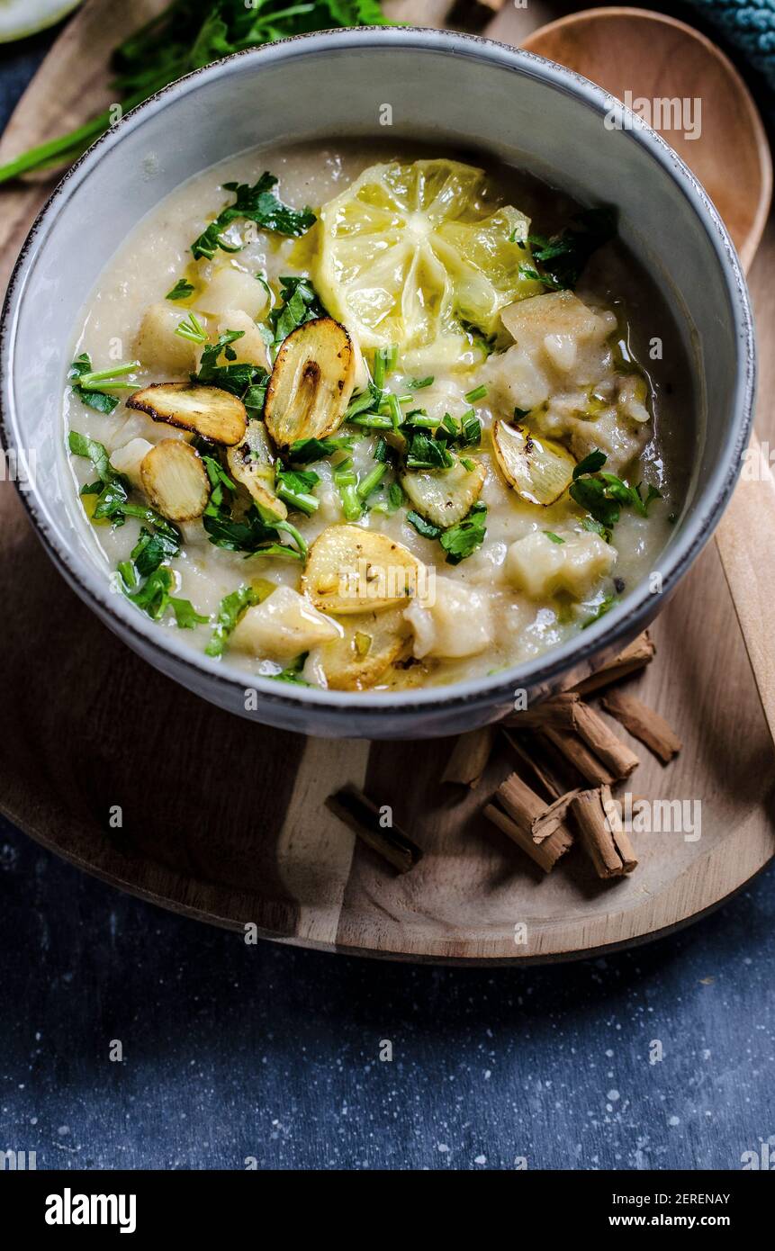 Celery and rice soup with lemon Stock Photo - Alamy
