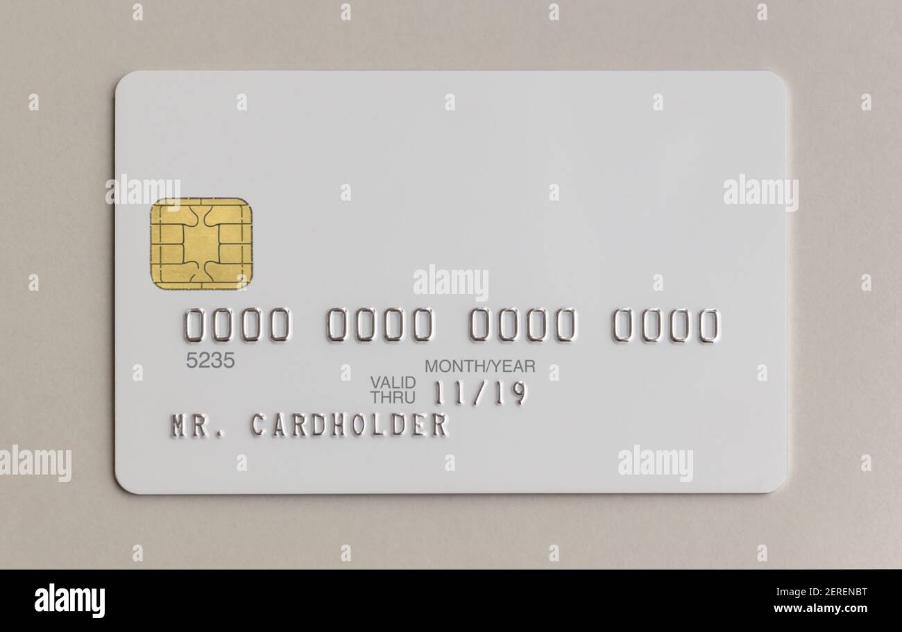 Blank white bank card on paper background Stock Photo - Alamy