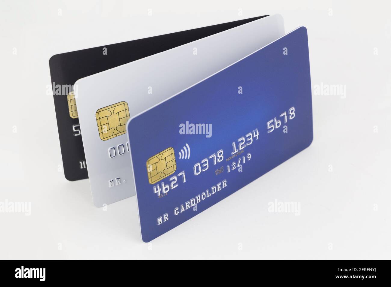 Three credit cards blue, white and black isolated on white background ...
