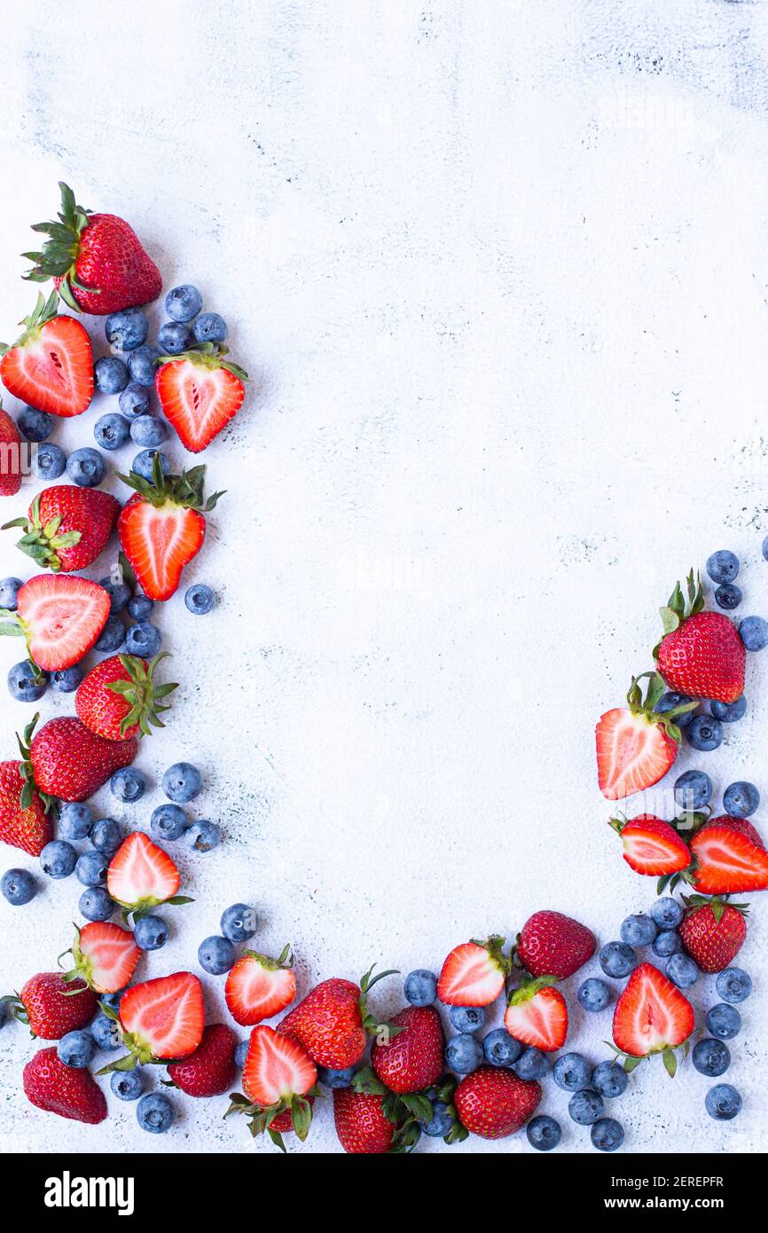Strawberry and Blueberry border Stock Photo - Alamy