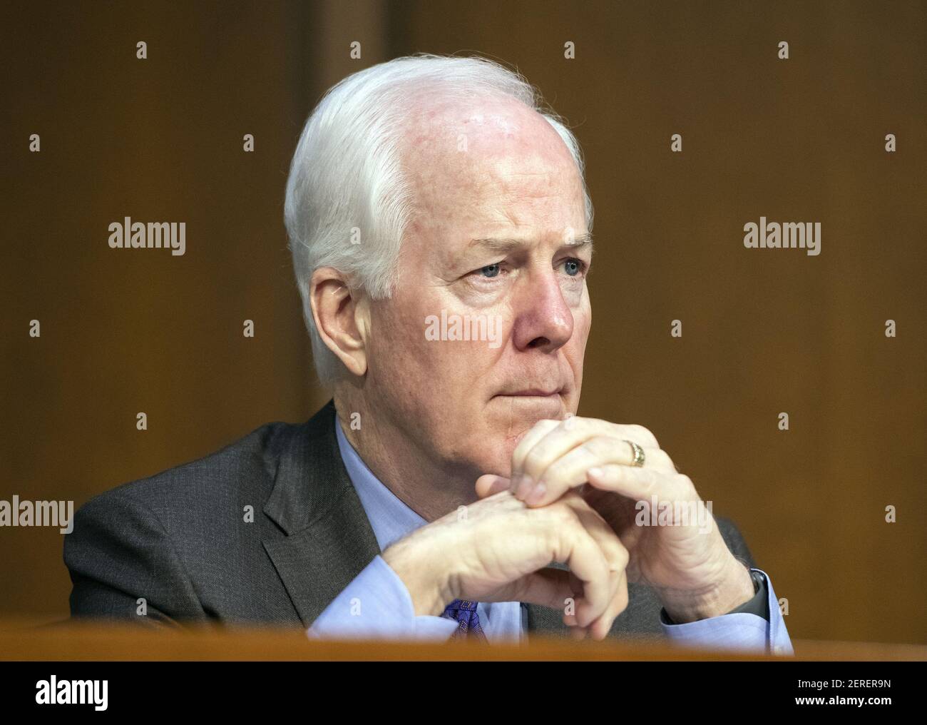 United States Senator John Cornyn (Republican of Texas) listens to ...