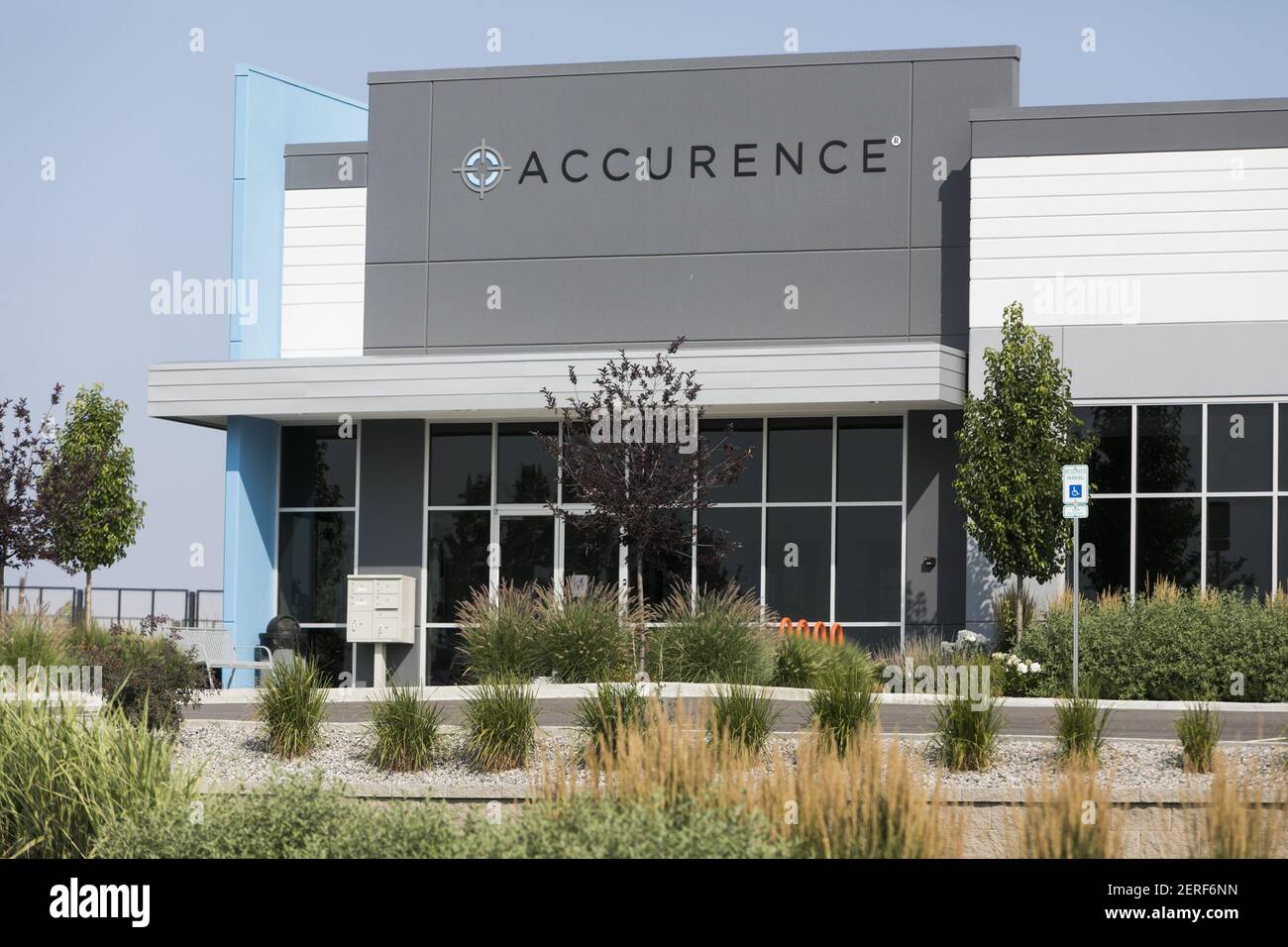A logo sign outside of the headquarters of Accurence in Louisville ...