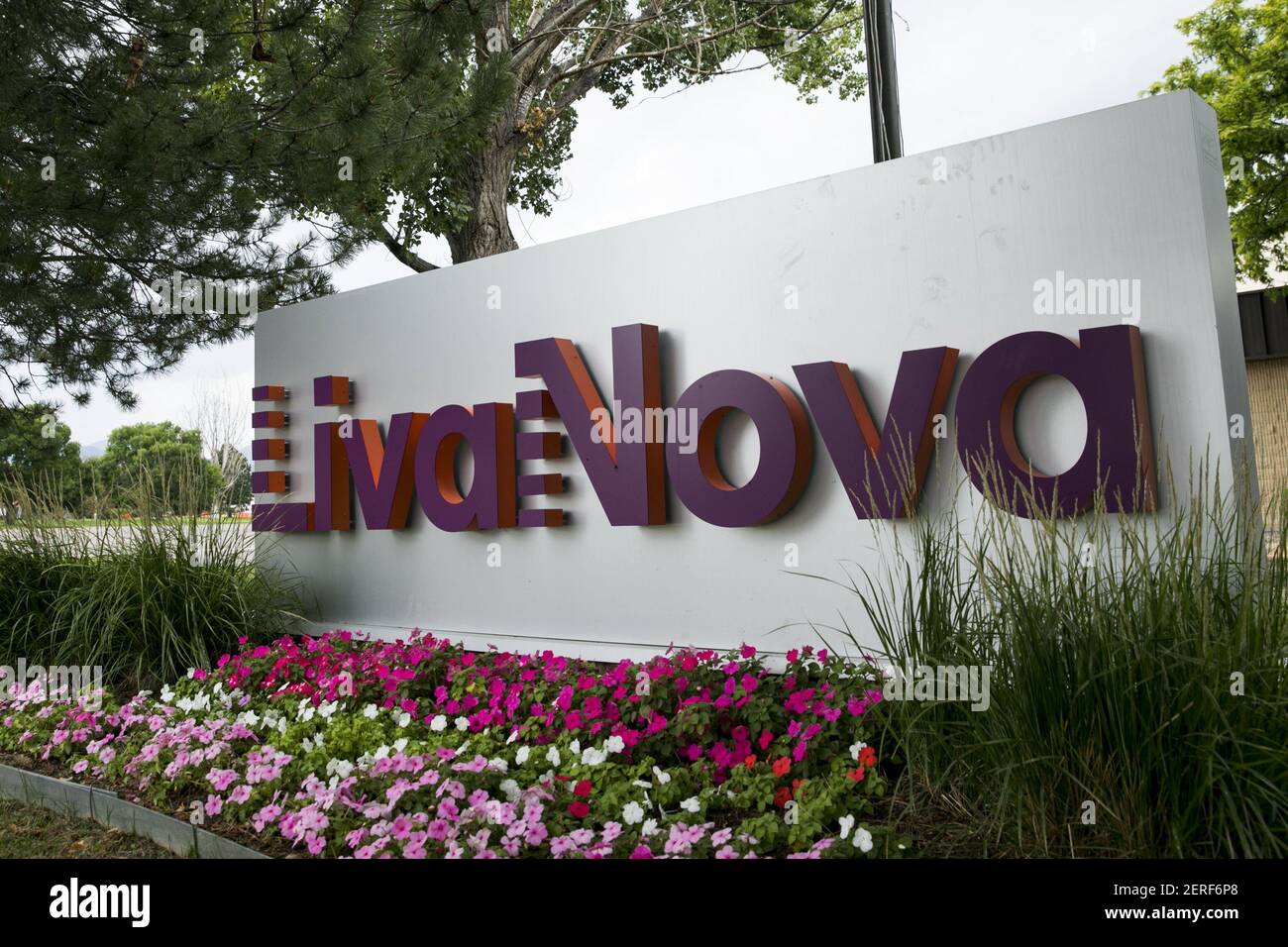 A logo sign outside of a facility occupied by LivaNova in Arvada ...