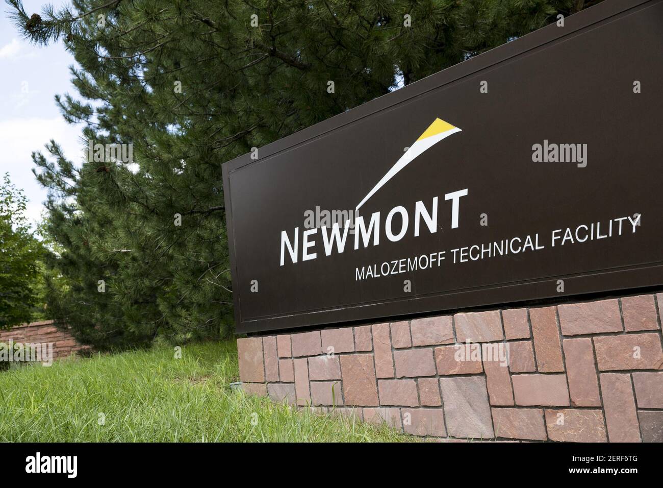 A logo sign outside of a facility occupied by the Newmont Mining ...