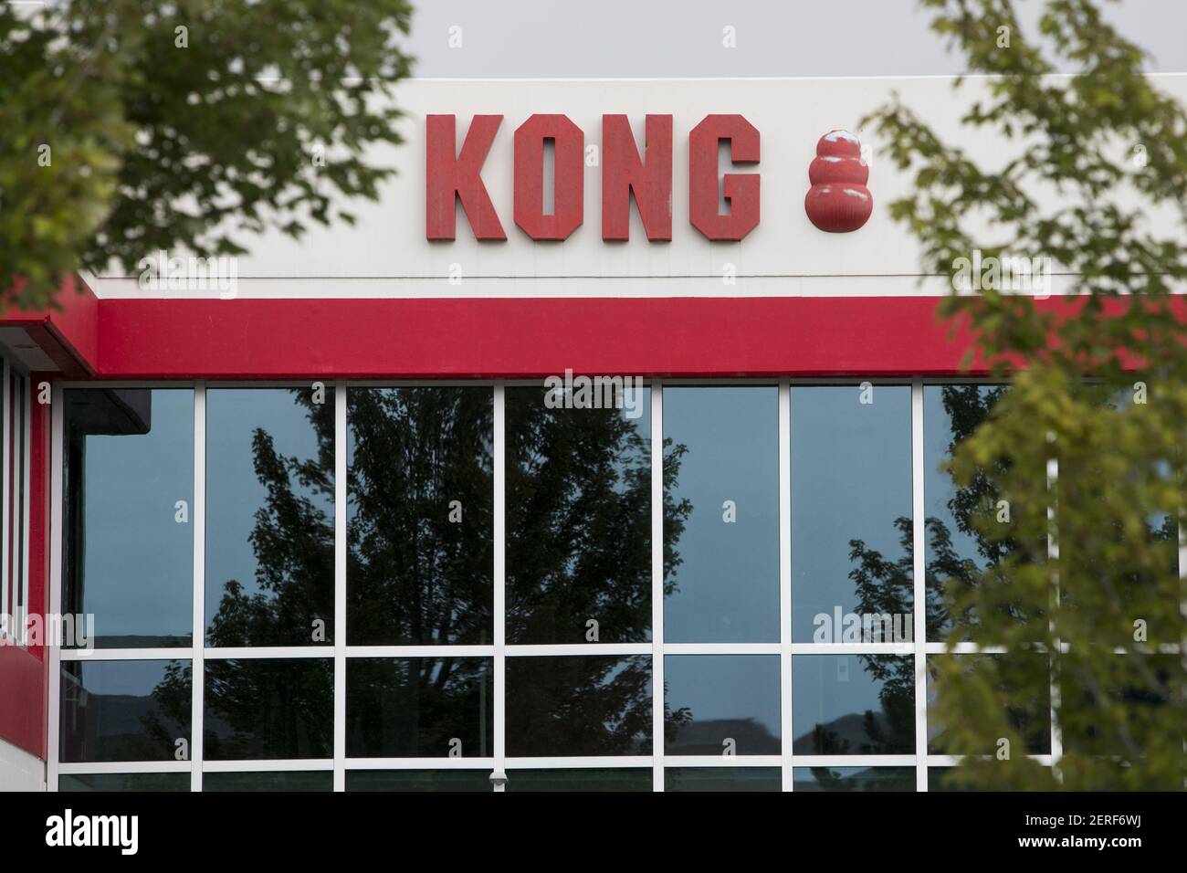 A logo sign outside of the headquarters of The Kong Company in Golden ...