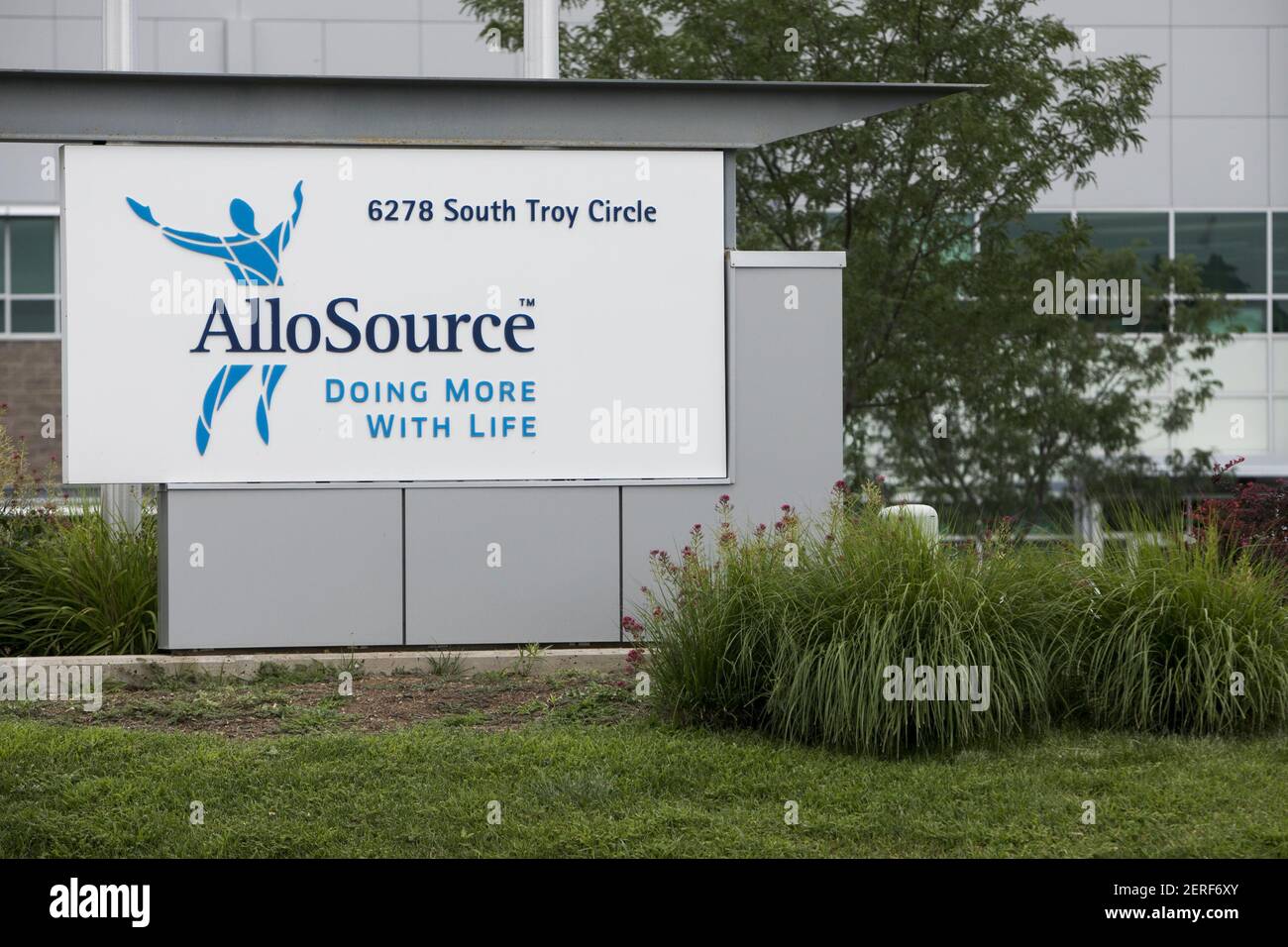 A logo sign outside of the headquarters of AlloSource in Centennial ...
