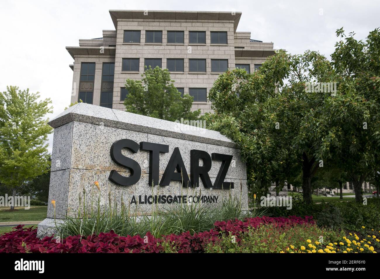 A logo sign outside of the headquarters of cable television network ...