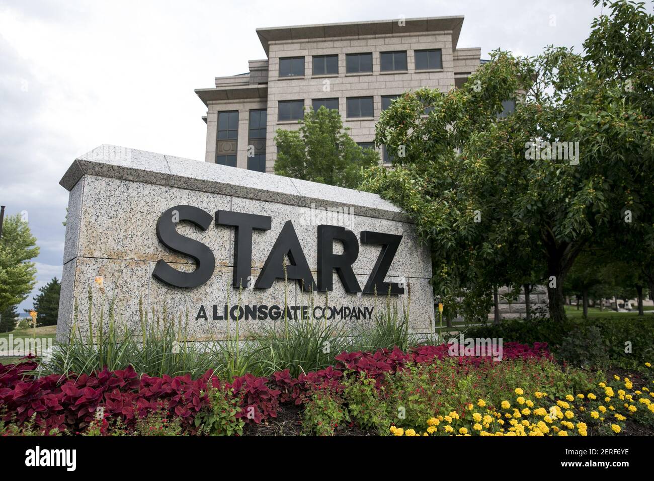A logo sign outside of the headquarters of cable television network ...