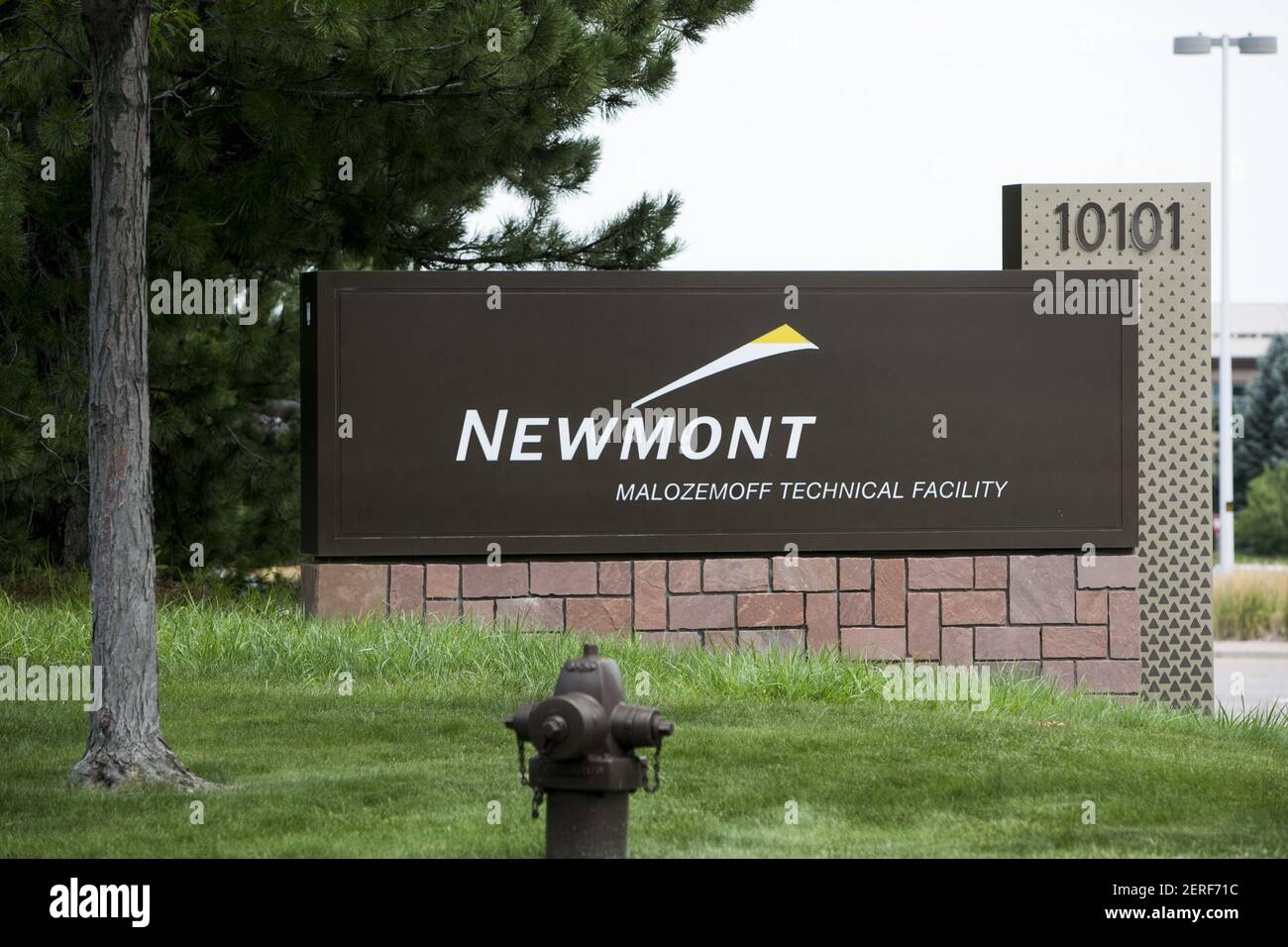A logo sign outside of a facility occupied by the Newmont Mining ...