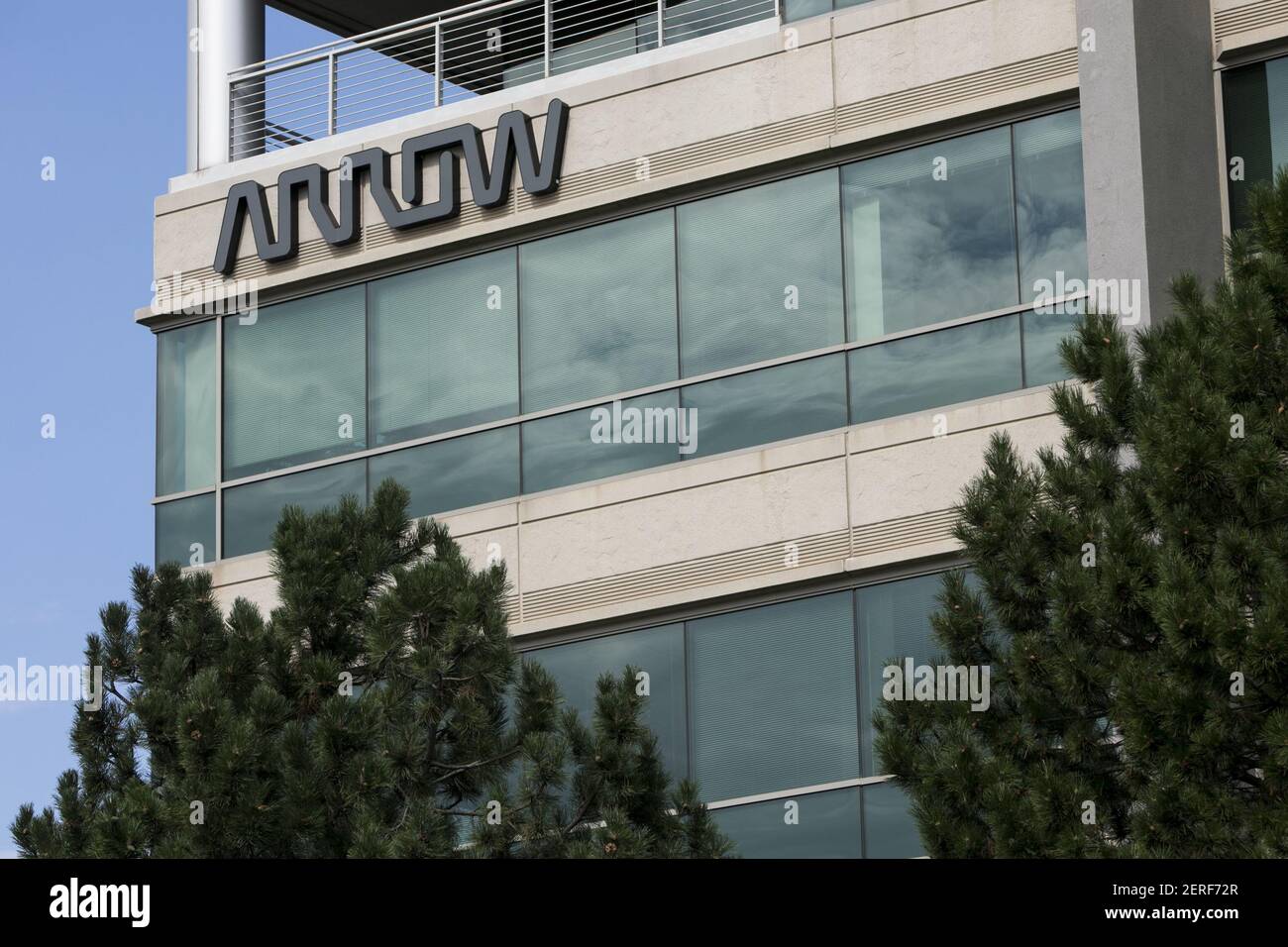 A logo sign outside of the headquarters of Arrow Electronics in ...
