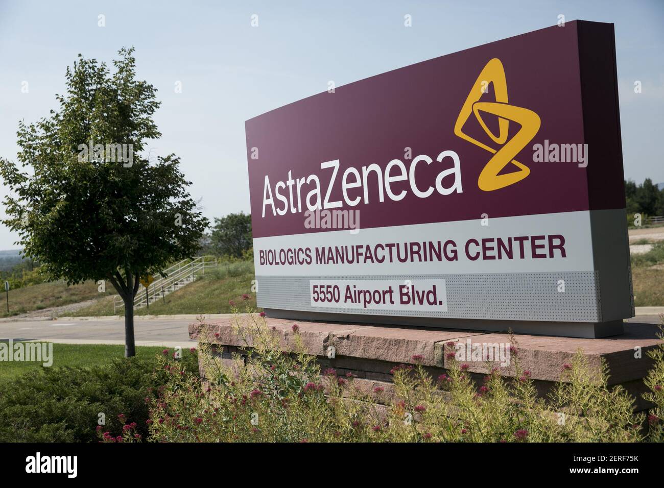 A logo sign outside of a facility occupied by AstraZeneca in Boulder ...