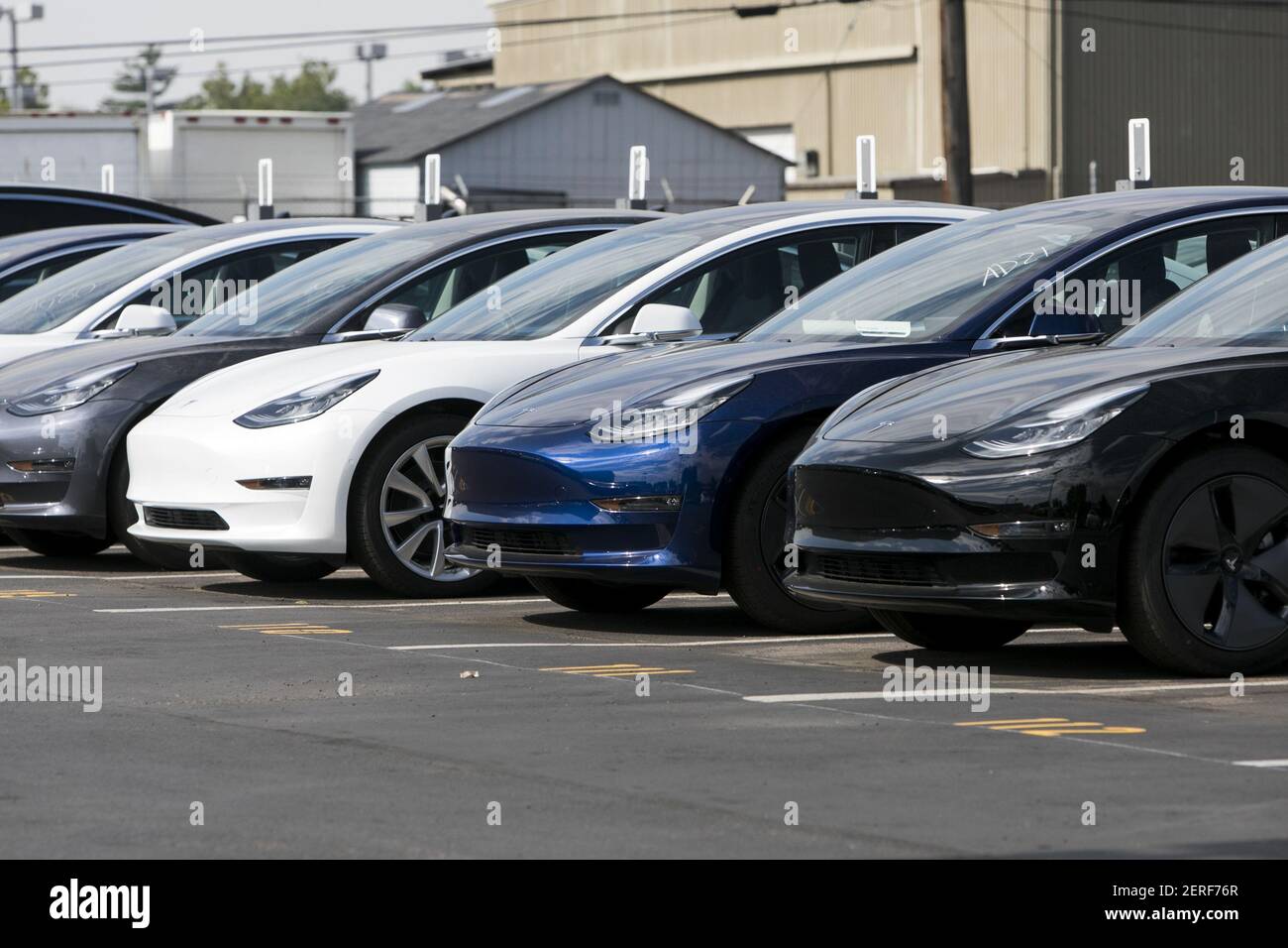 Tesla Model 3 electric vehicles at a Tesla Store location in Littleton ...