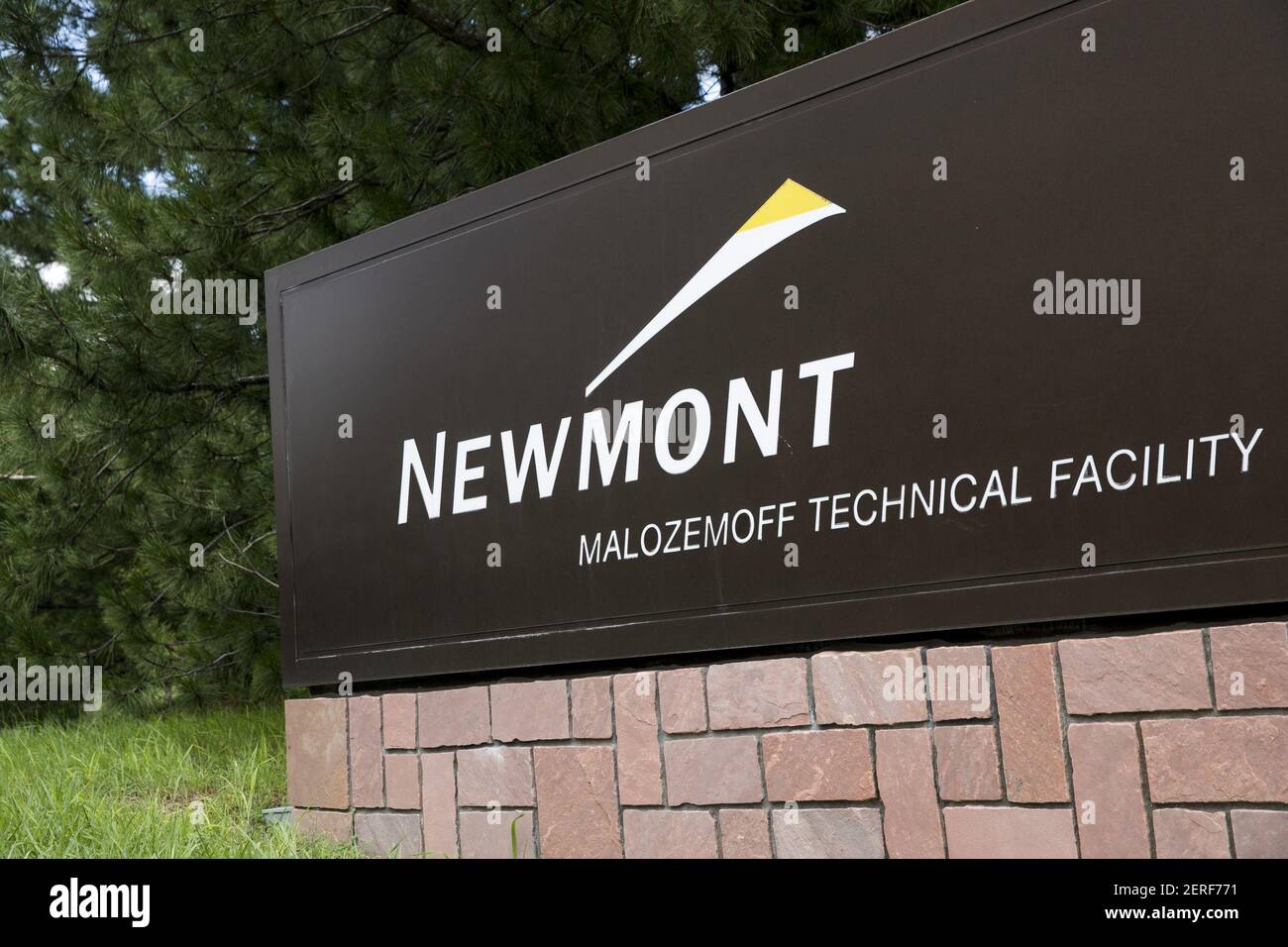 A logo sign outside of a facility occupied by the Newmont Mining ...