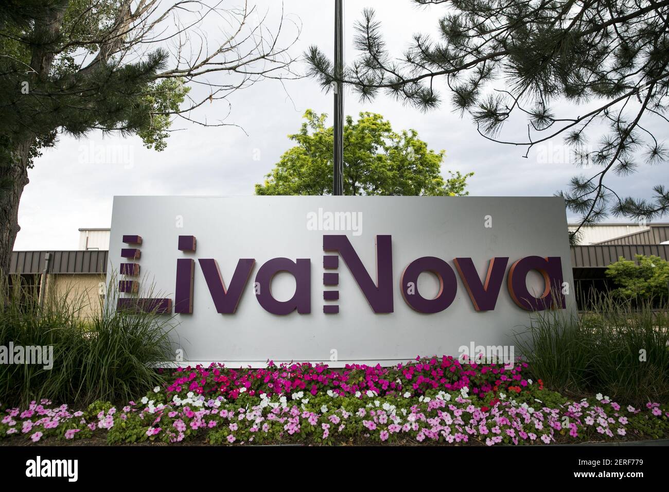 A logo sign outside of a facility occupied by LivaNova in Arvada ...