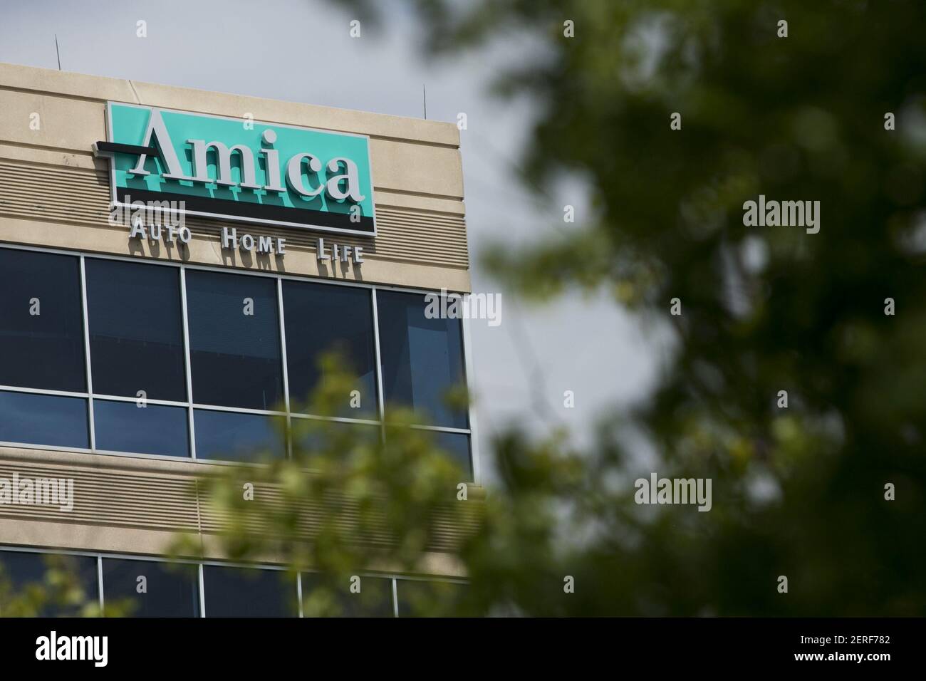 A logo sign outside of a facility occupied by the Amica Mutual ...