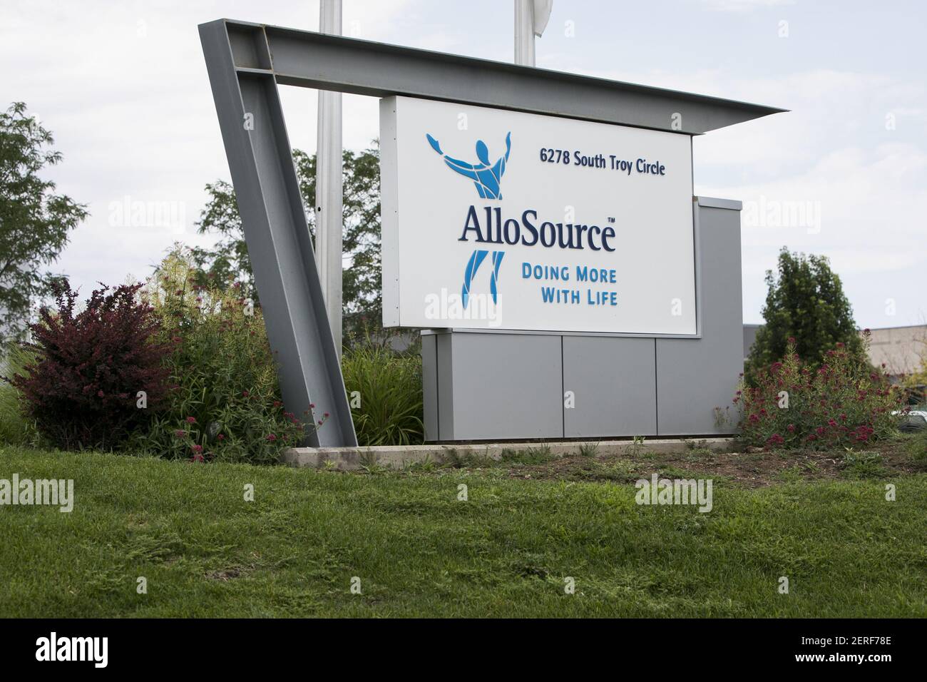 A logo sign outside of the headquarters of AlloSource in Centennial ...