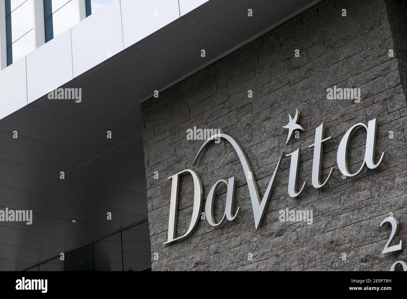 A logo sign outside of the headquarters of DaVita, Inc., in Denver ...