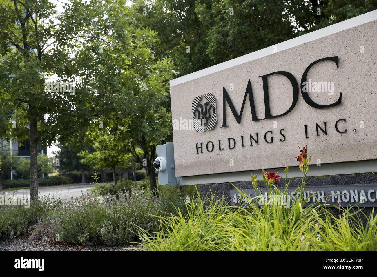 A logo sign outside of the headquarters of MDC Holdings in Denver ...