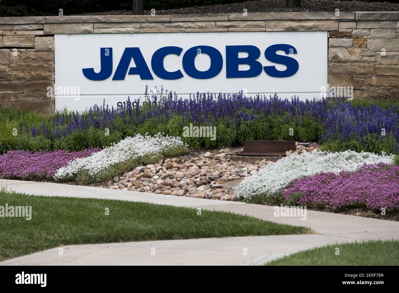 A logo sign outside of a facility occupied by the Jacobs Engineering ...