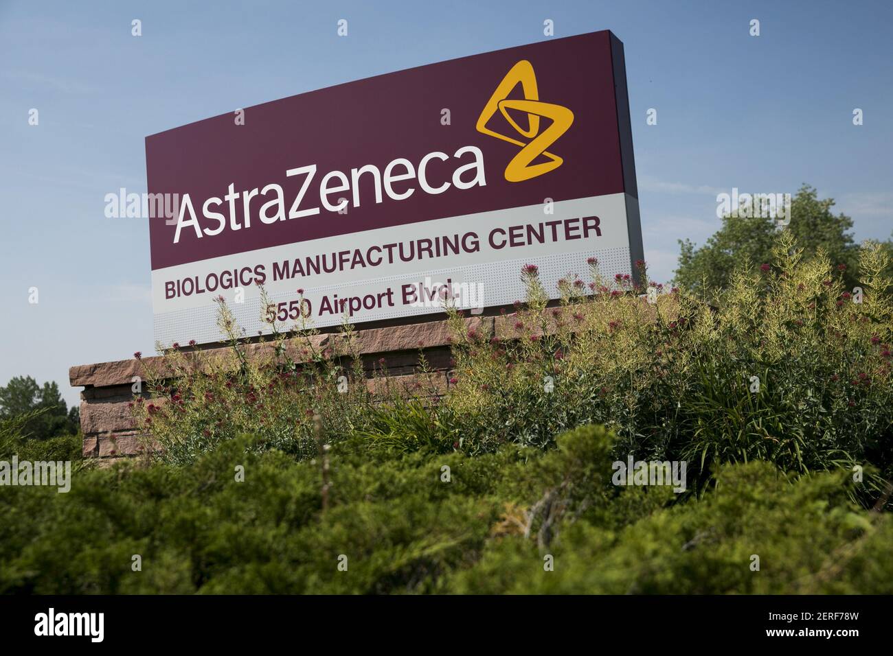 A logo sign outside of a facility occupied by AstraZeneca in Boulder ...