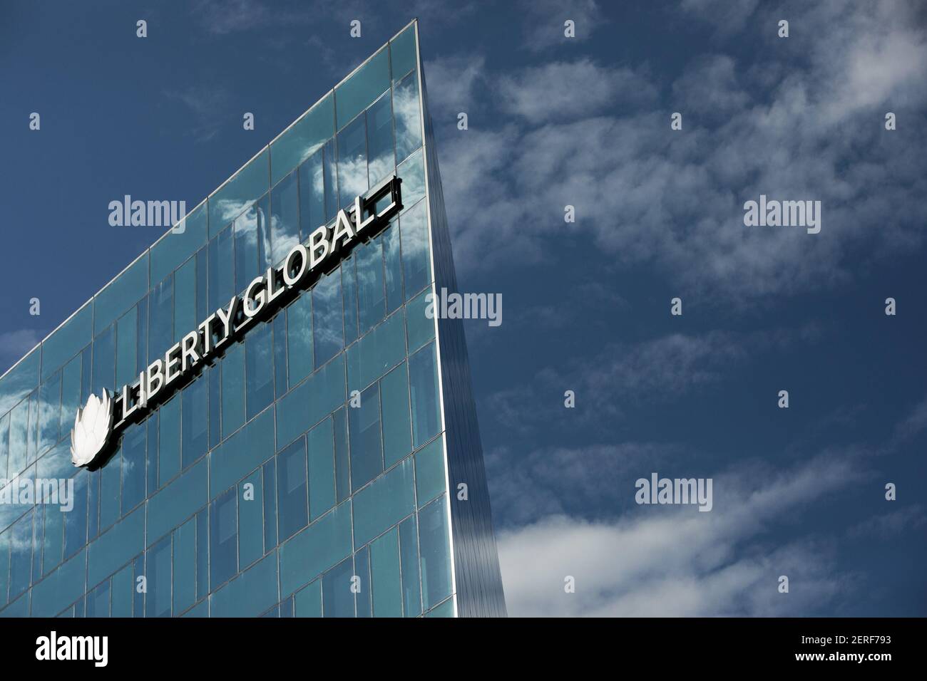 A logo sign outside of a facility occupied by Liberty Global in Denver ...
