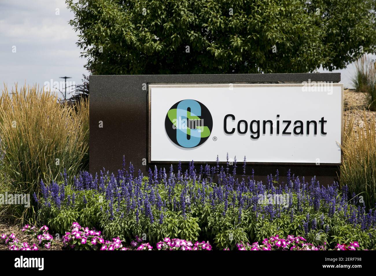 A logo sign outside of a facility occupied by Cognizant in Englewood ...