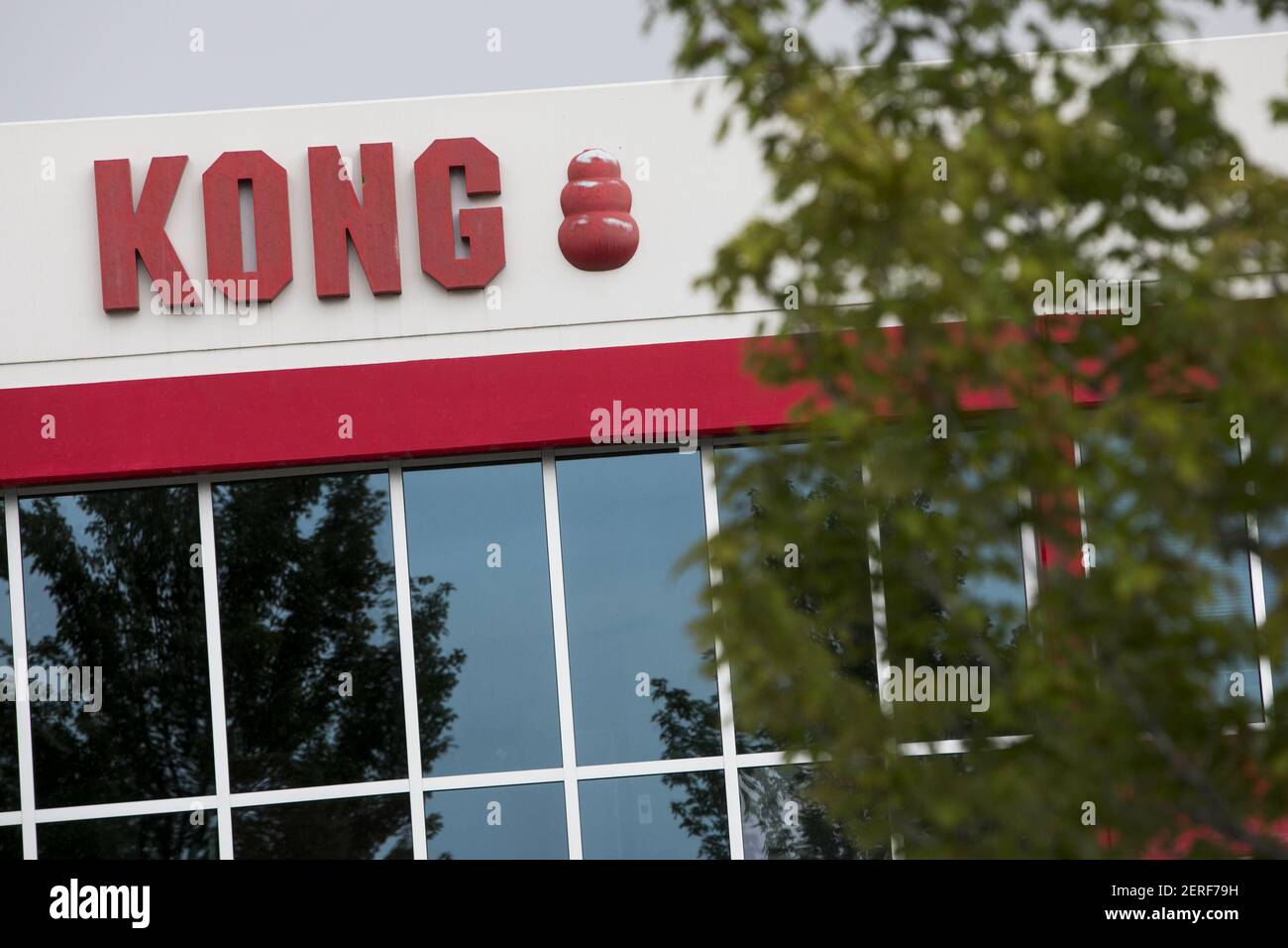 A logo sign outside of the headquarters of The Kong Company in Golden ...