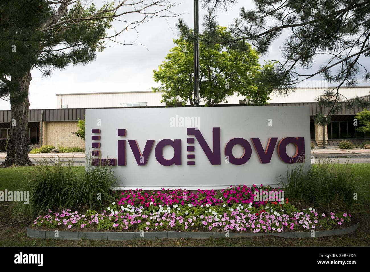 A logo sign outside of a facility occupied by LivaNova in Arvada ...