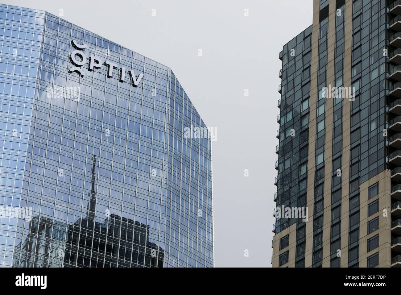 A logo sign outside of the headquarters of Optiv Security, Inc., in ...