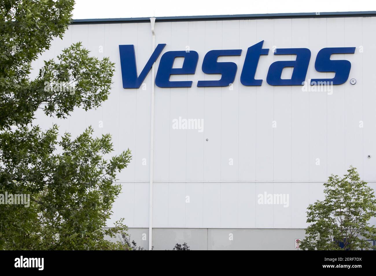 A logo sign outside of a facility occupied by Vestas Wind Systems in ...