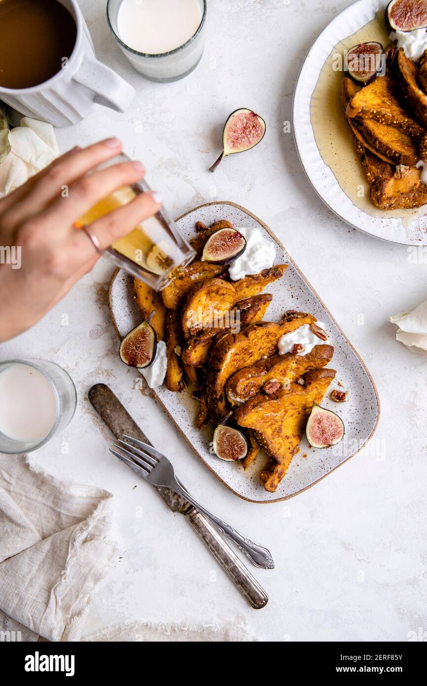 Pumpkin French Toast with maple syrup and figs Stock Photo - Alamy