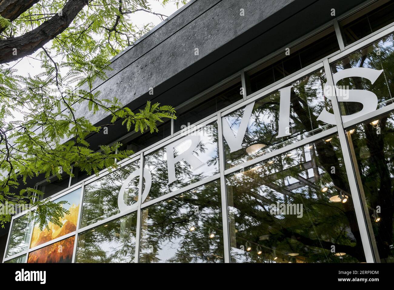 A logo sign outside of a Orvis retail store location in Denver ...