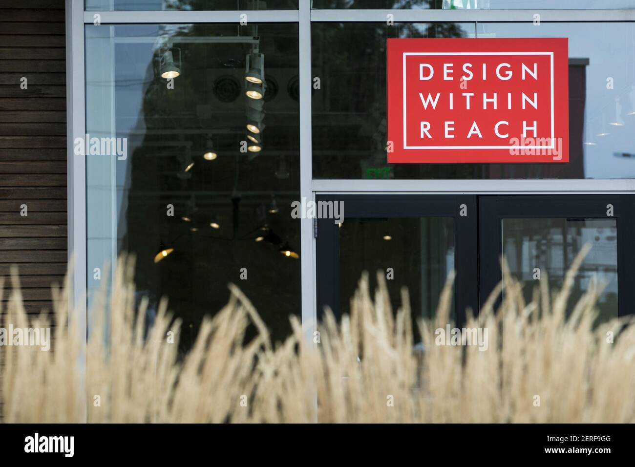 A logo sign outside of a Design Within Reach retail store location in ...