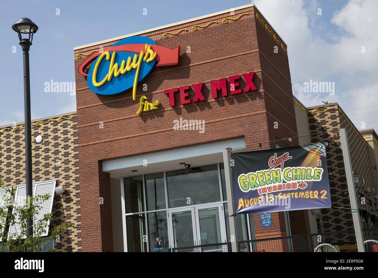 A logo sign outside of a Chuy's restaurant location in Westminster ...