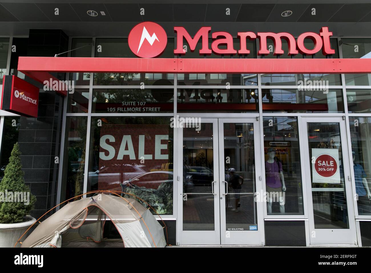 A logo sign outside of a Marmot Mountain retail store location in ...