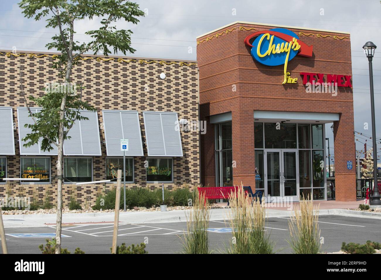 A logo sign outside of a Chuy's restaurant location in Westminster ...