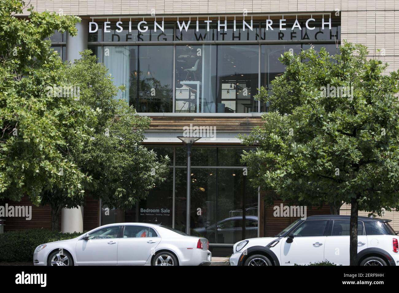 A logo sign outside of a Design Within Reach retail store location in ...