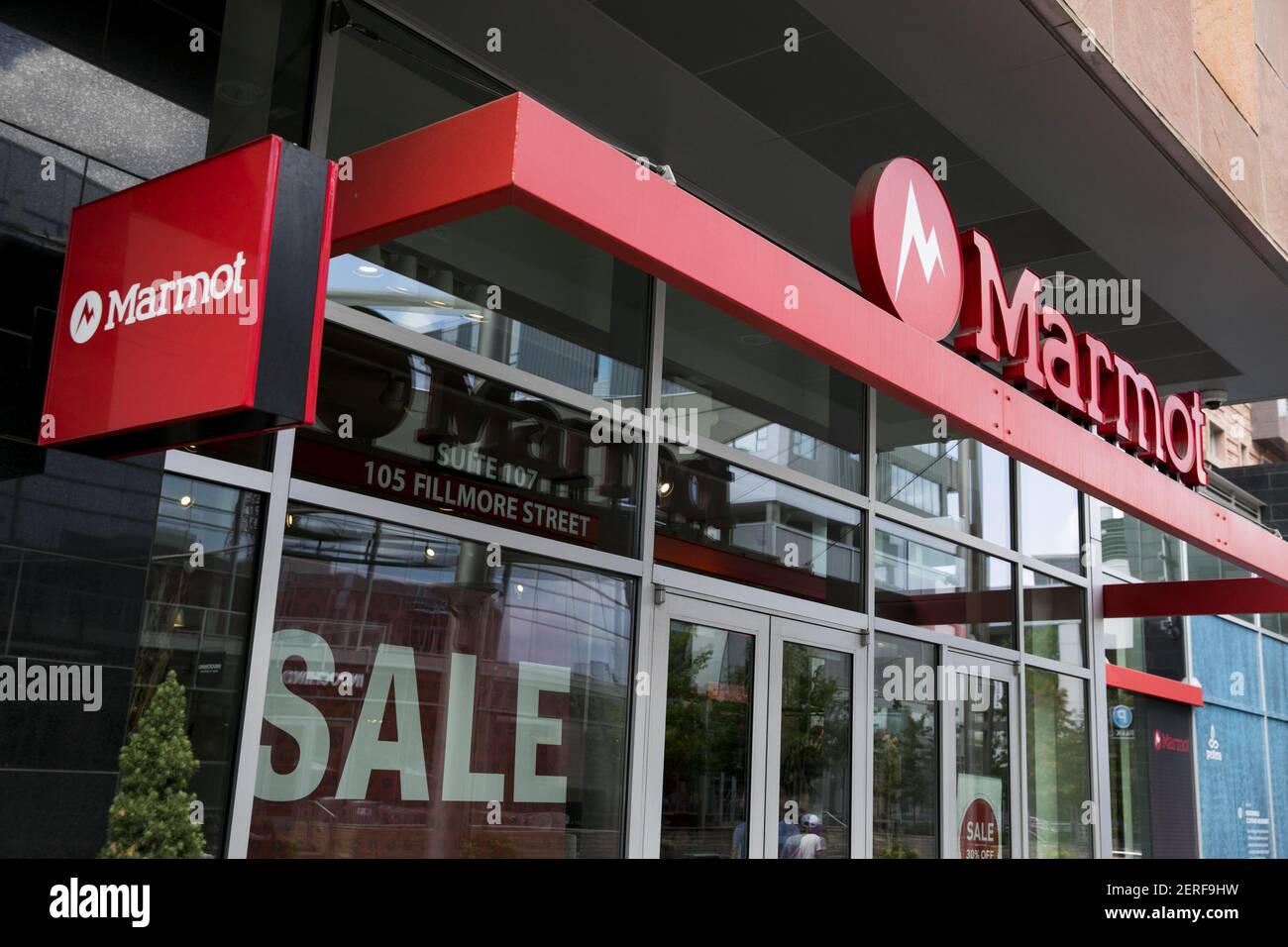 A logo sign outside of a Marmot Mountain retail store location in ...