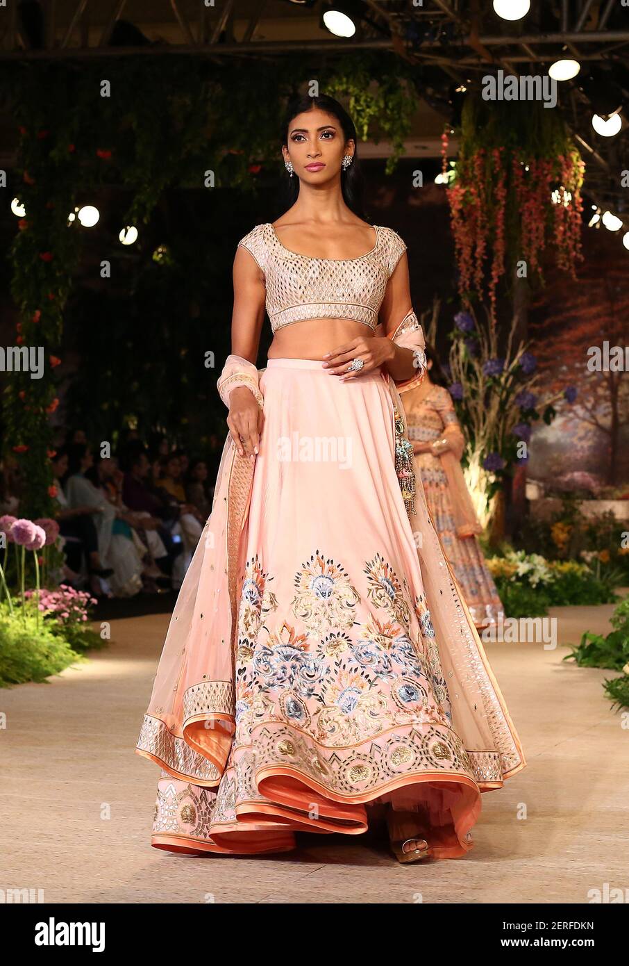 NEW DELHI, INDIA - JULY 29: A model showcases the collection of fashion ...