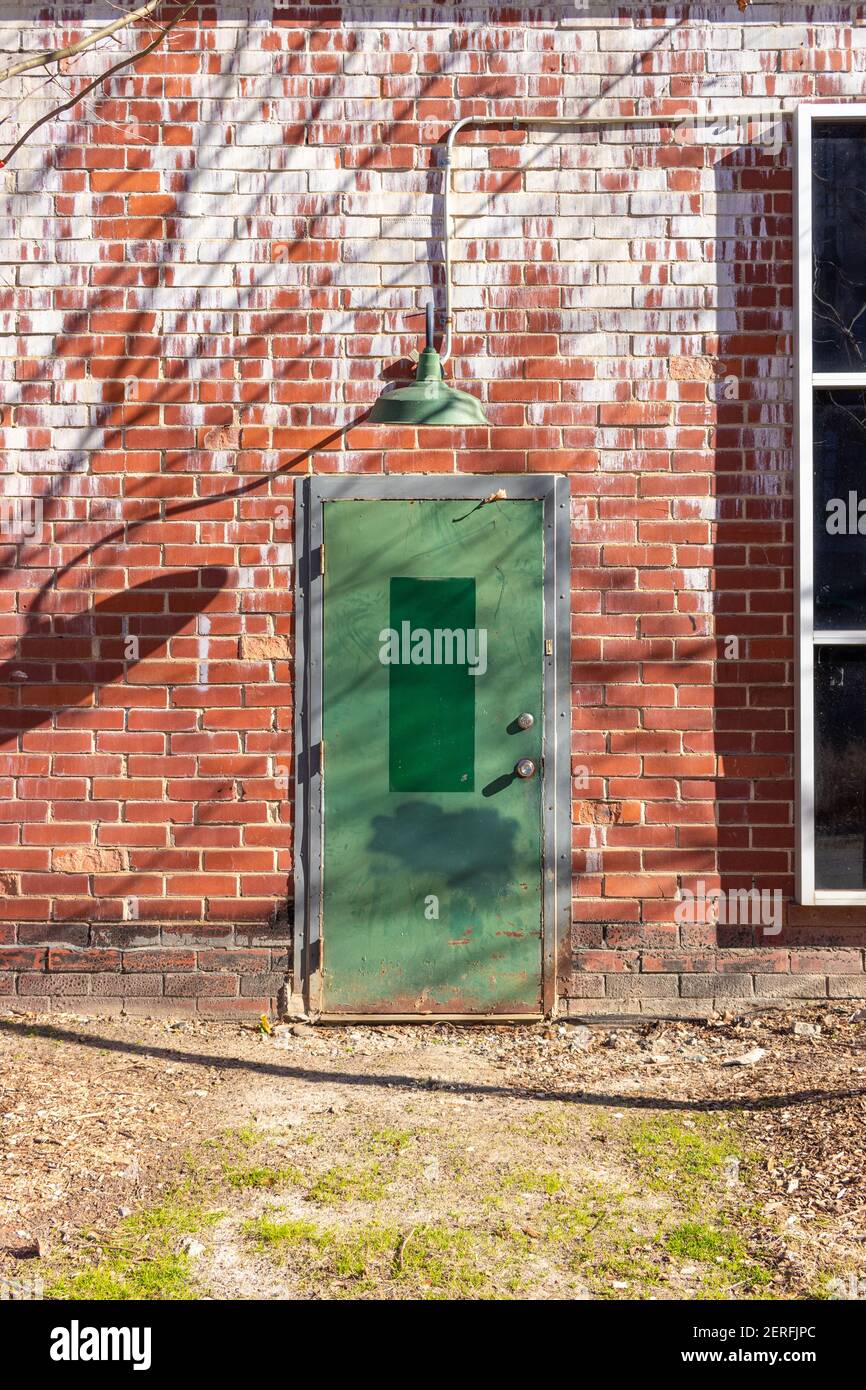 Entrance door with lamp Stock Photo - Alamy